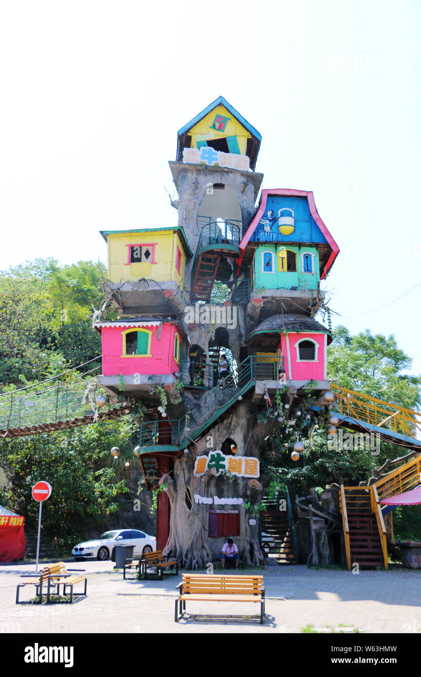 View of a three-storey tree house with nine rooms, dubbed as the city's ...