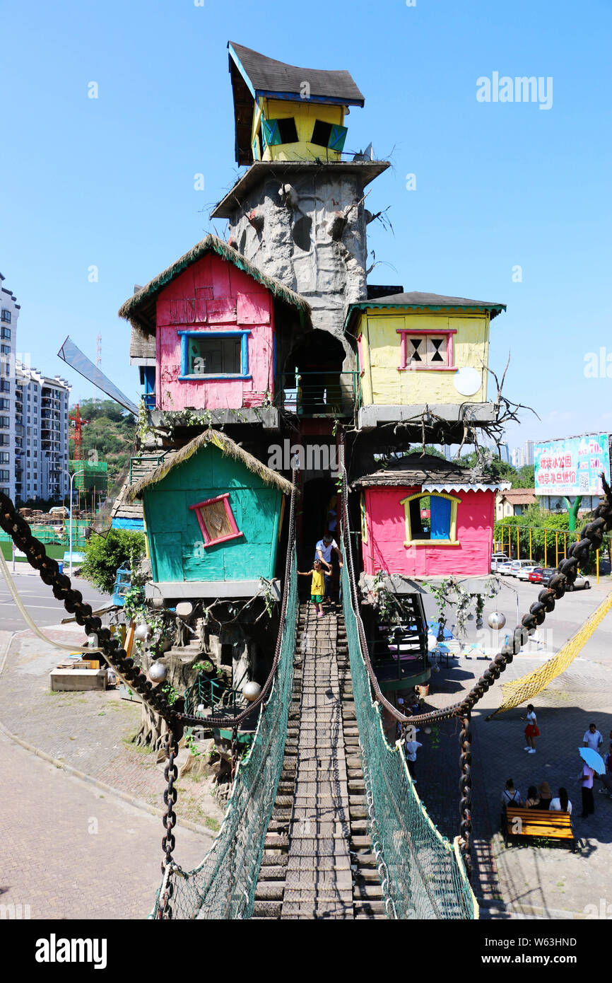 View of a three-storey tree house with nine rooms, dubbed as the city's ...