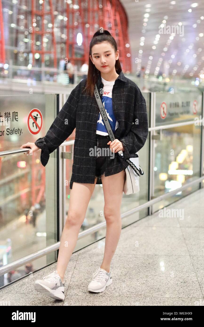 Chinese actress Song Zu'er arrives at the Beijing Capital International Airport as she prepares ...