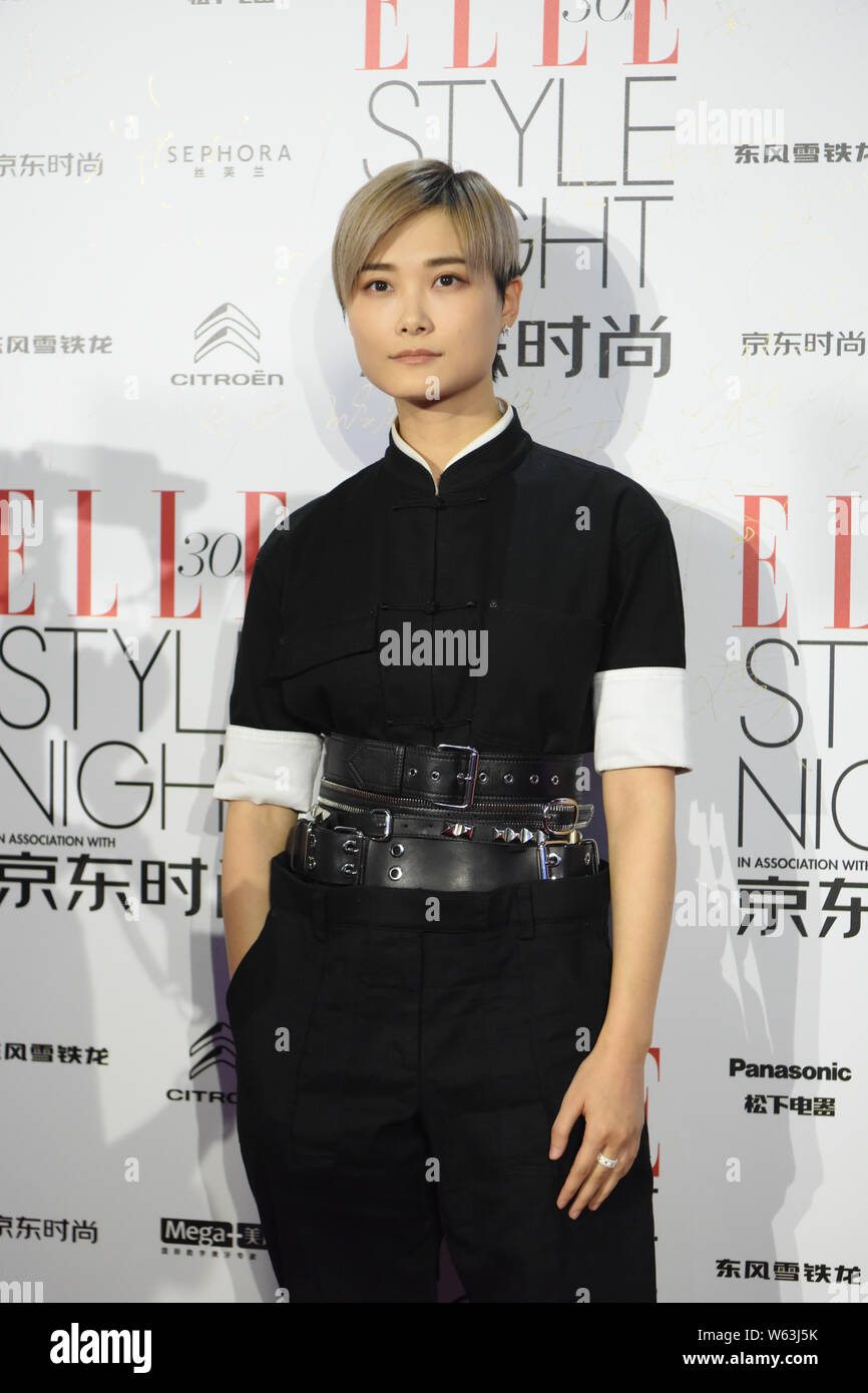 Chinese singer Li Yuchun arrives on the red carpet for the "ELLE China ...