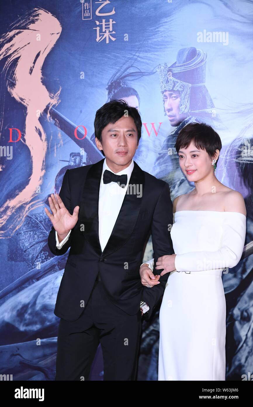 Chinese actress Sun Li, right, and her actor husband Deng Chao arrive ...