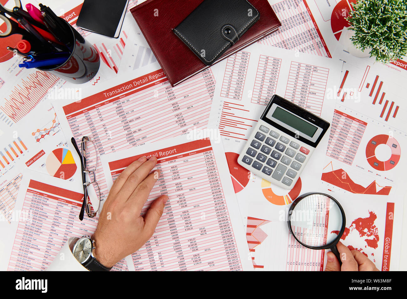 Business reports, data tables and charts - directly above view of ...