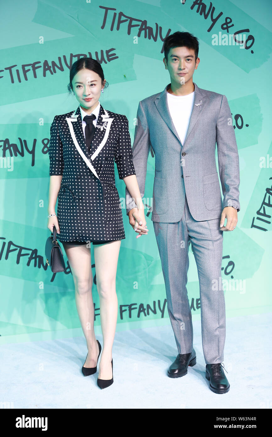 Chinese actress Huo Siyan, left, and her actor husband Du Jiang attend ...