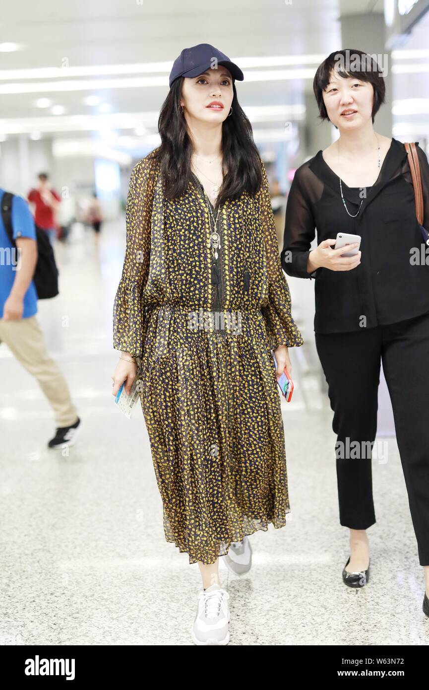 Chinese actress Yao Chen arrives at the Shanghai Hongqiao International Airport before departure ...