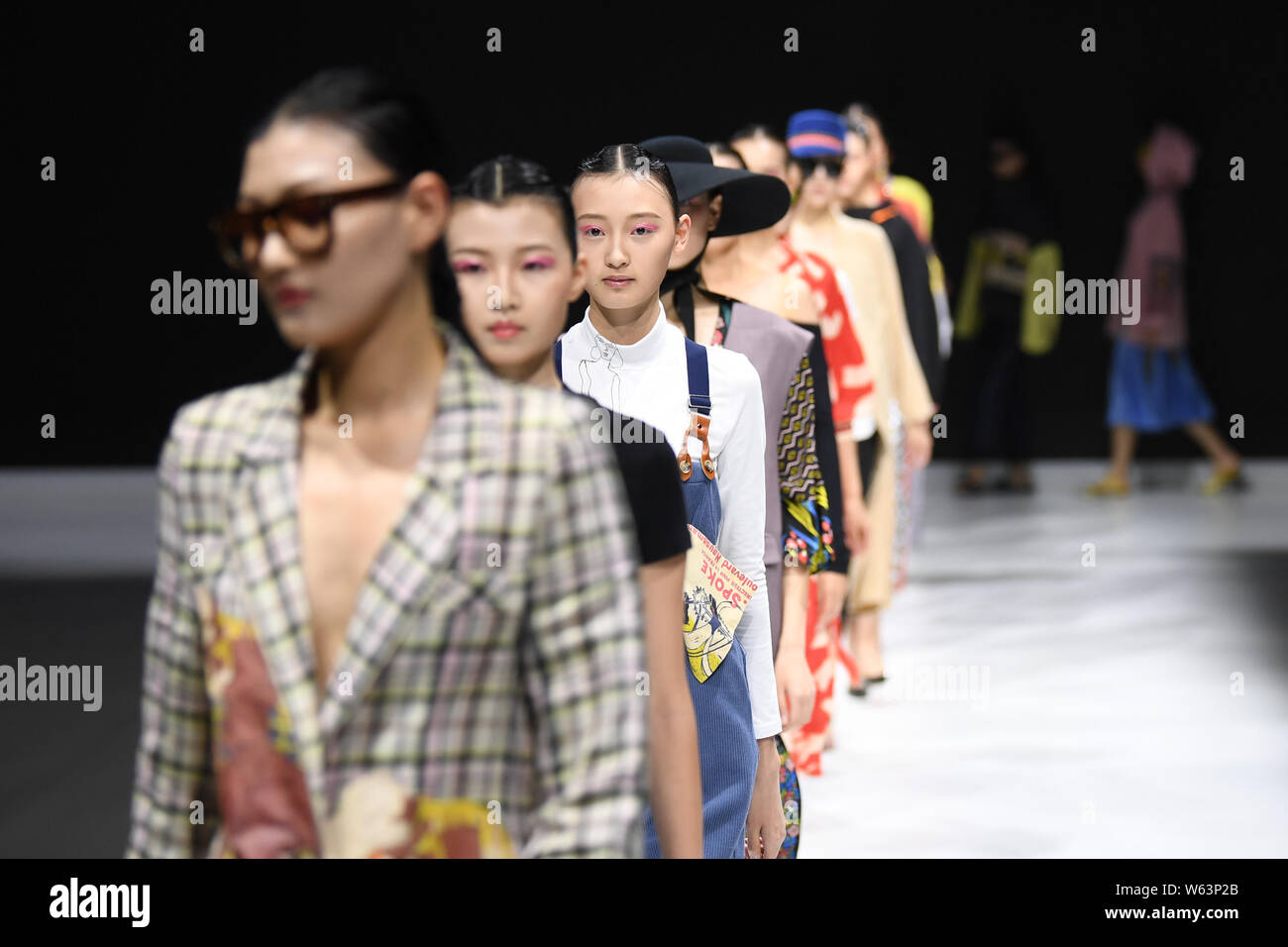 Models display new creations at the JD x Something fashion show during ...