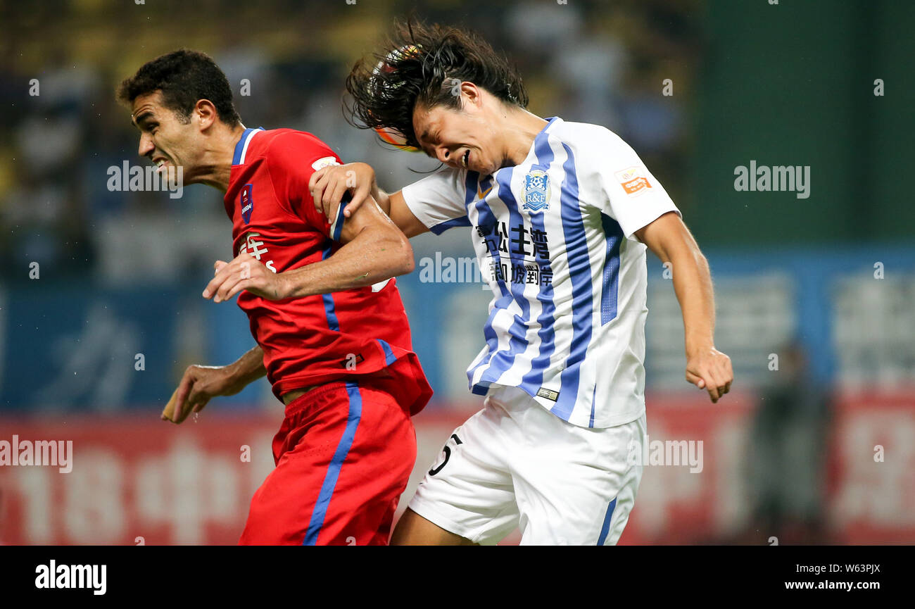 Brazilian football player Alan Kardec, left, of Chongqing SWM ...