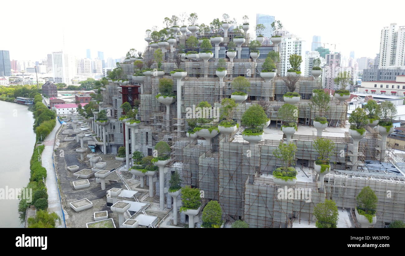 An aerial view of high-rise buildings with terraces of different ...