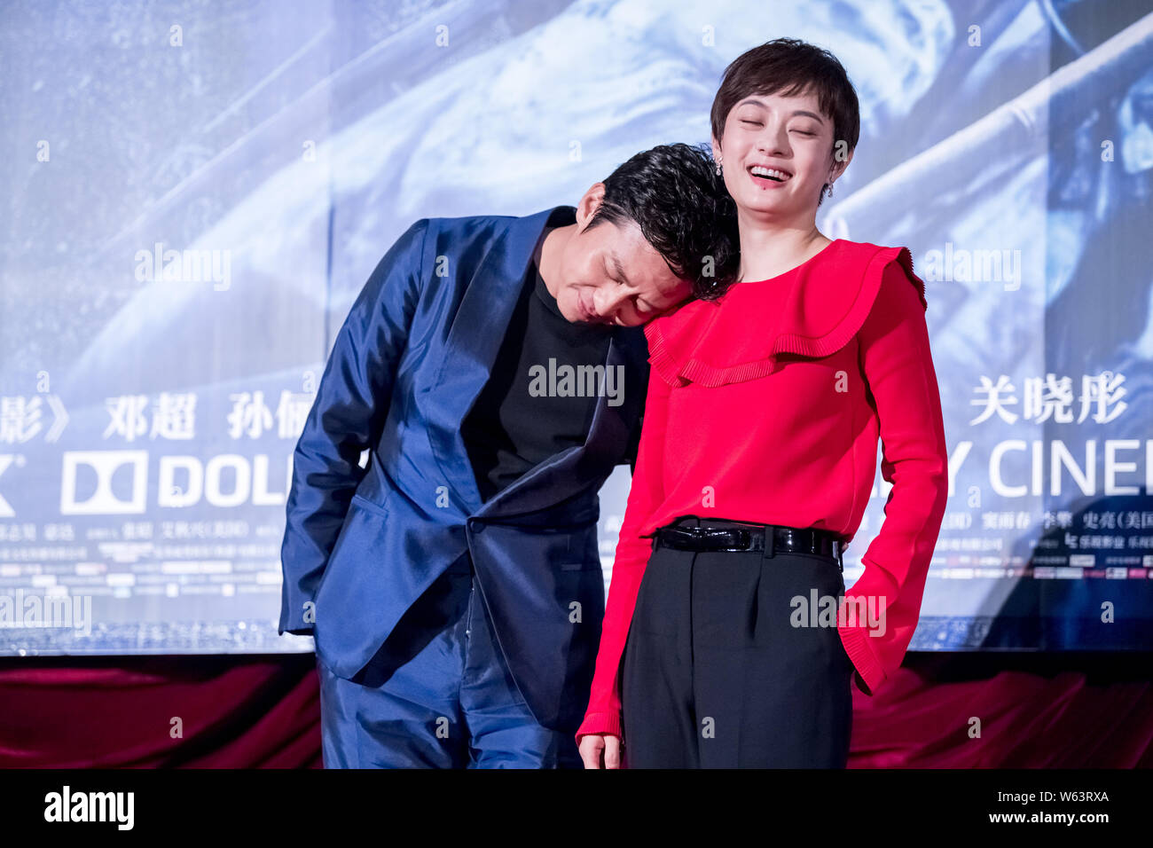 Chinese actress Sun Li, right, and her husband actor Deng Chao attend a ...