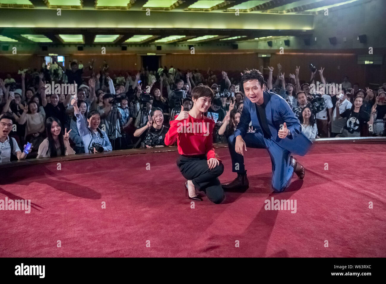 Chinese actress Sun Li, left, and her husband actor Deng Chao attend a ...