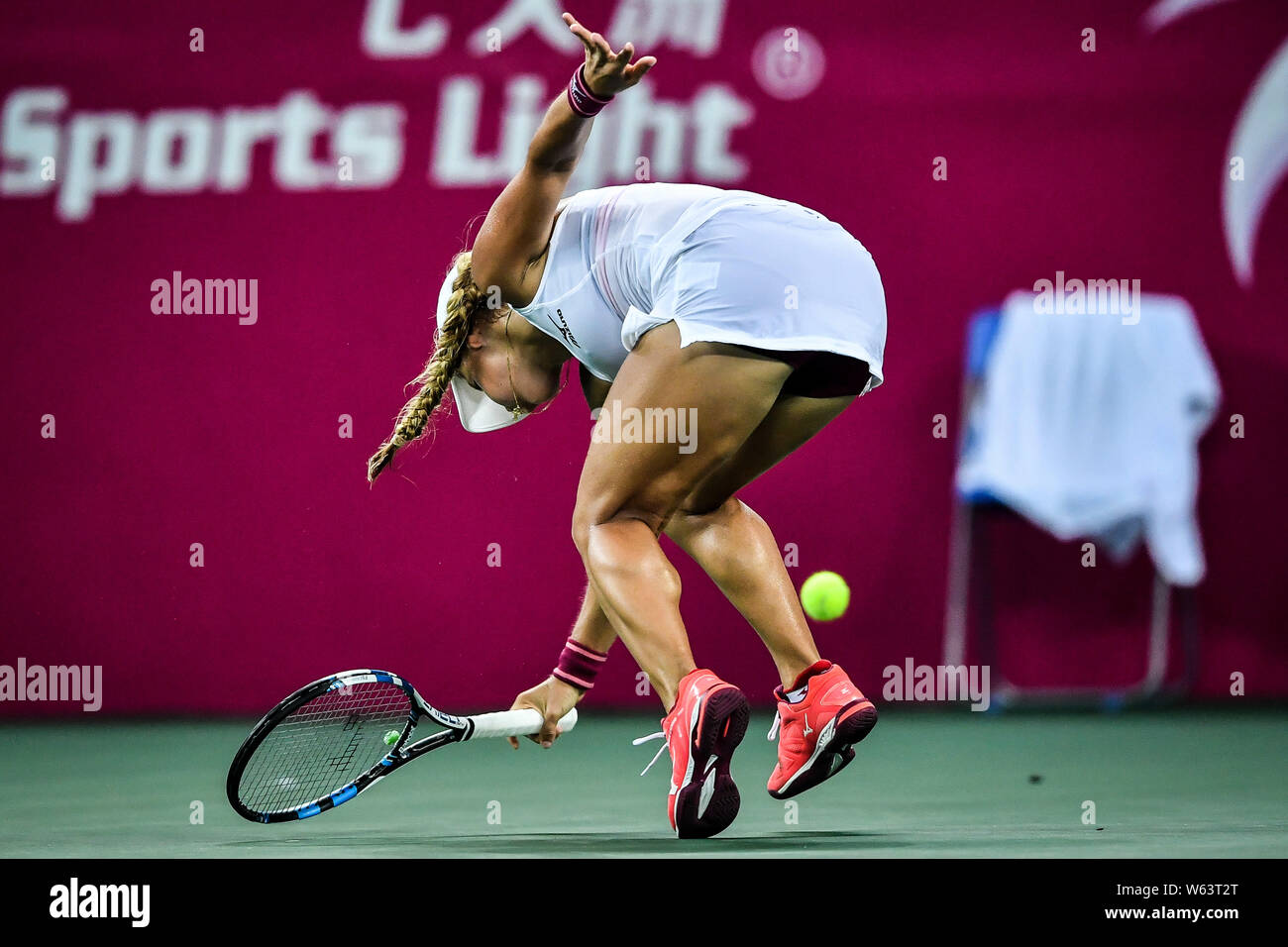 Yulia Putintseva of Kazakhstan returns a shot to Bernarda Pera of the ...