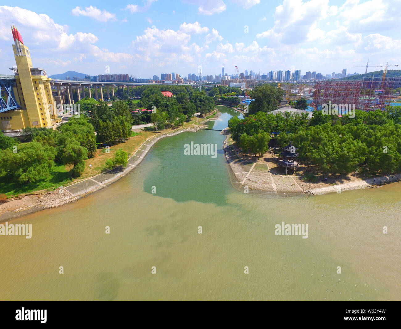 Aerial view of the sandy Yangtze River meeting the clean Hanjiang River ...