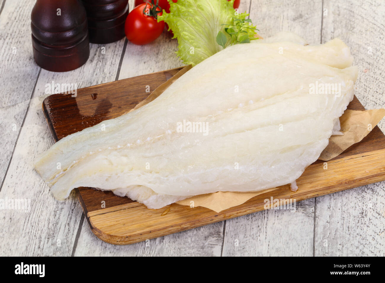 Raw halibut fillet ready for cooking Stock Photo - Alamy