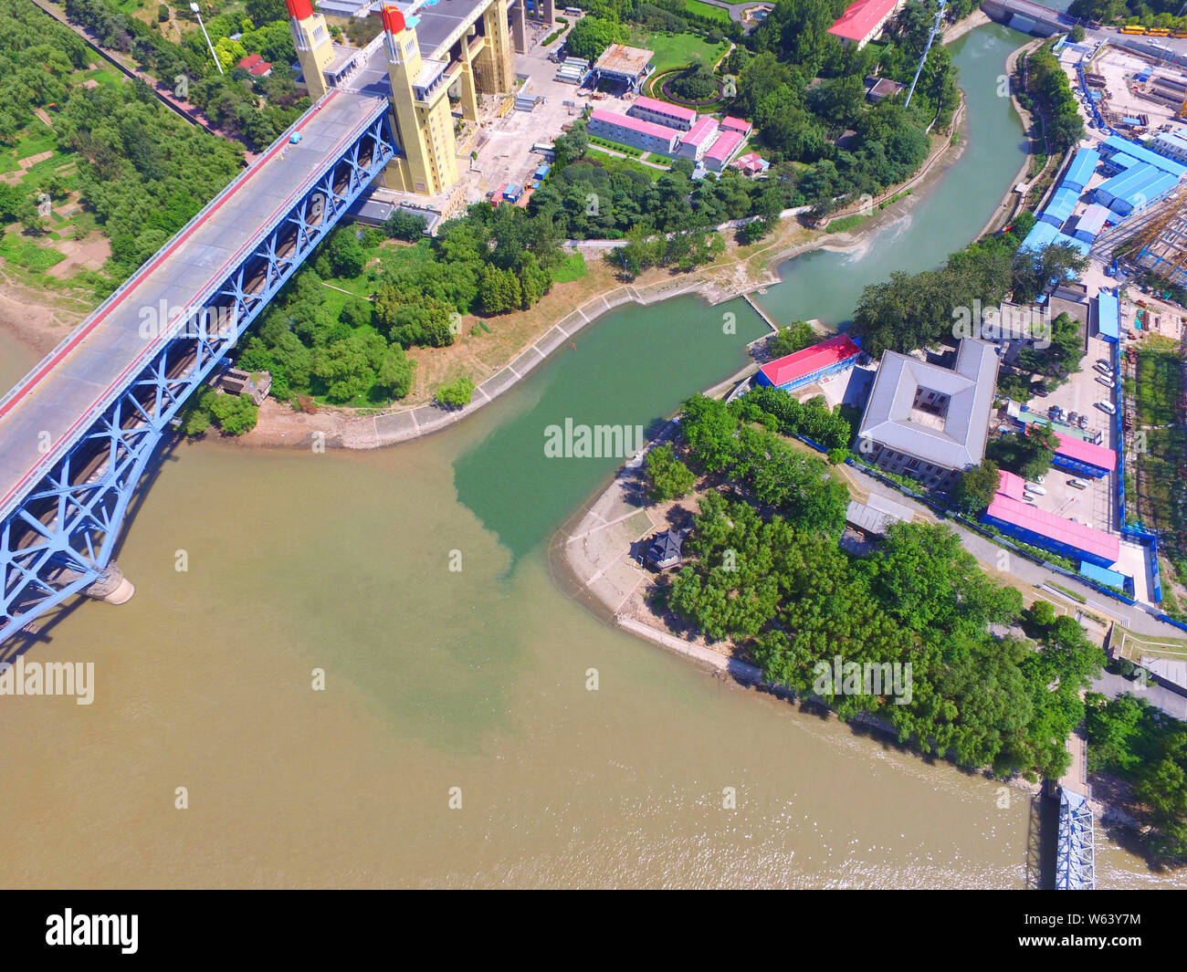 Aerial view of the sandy Yangtze River meeting the clean Hanjiang River ...