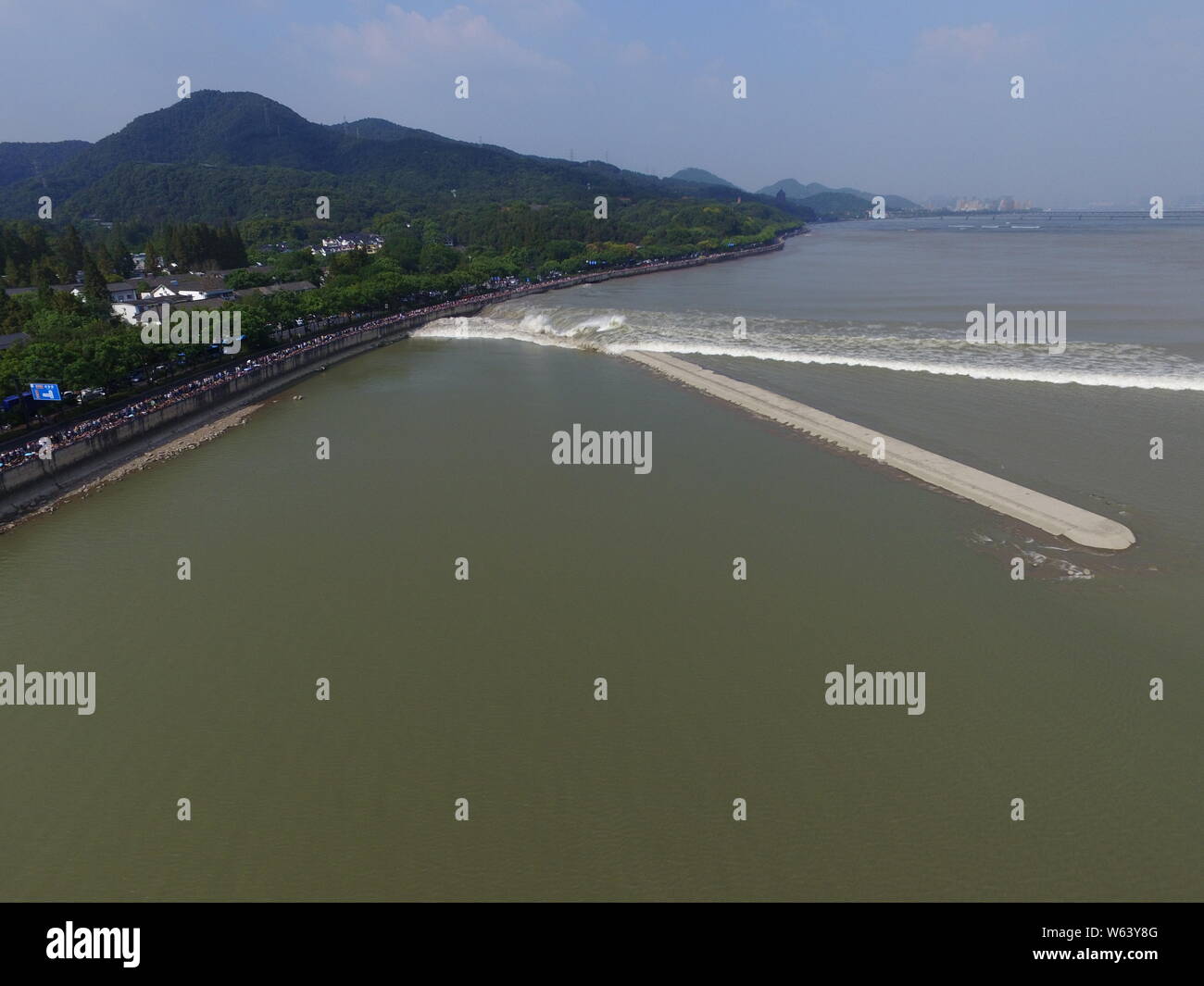 Aerial view of tidal bores from the Qiantang River surging the ...