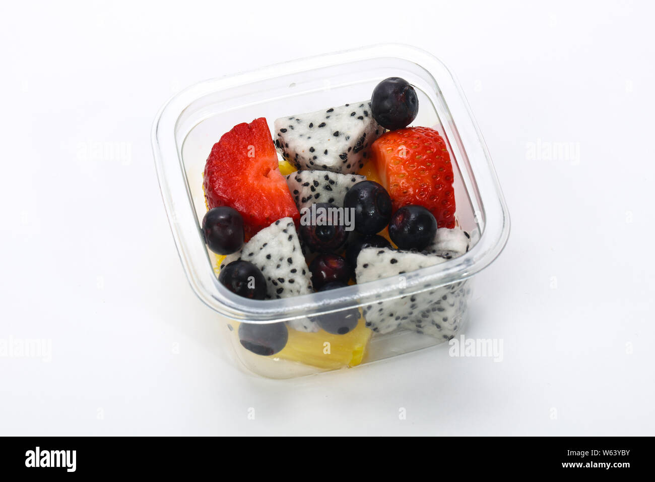 Sliced tropical fruit mix snack in the box Stock Photo - Alamy