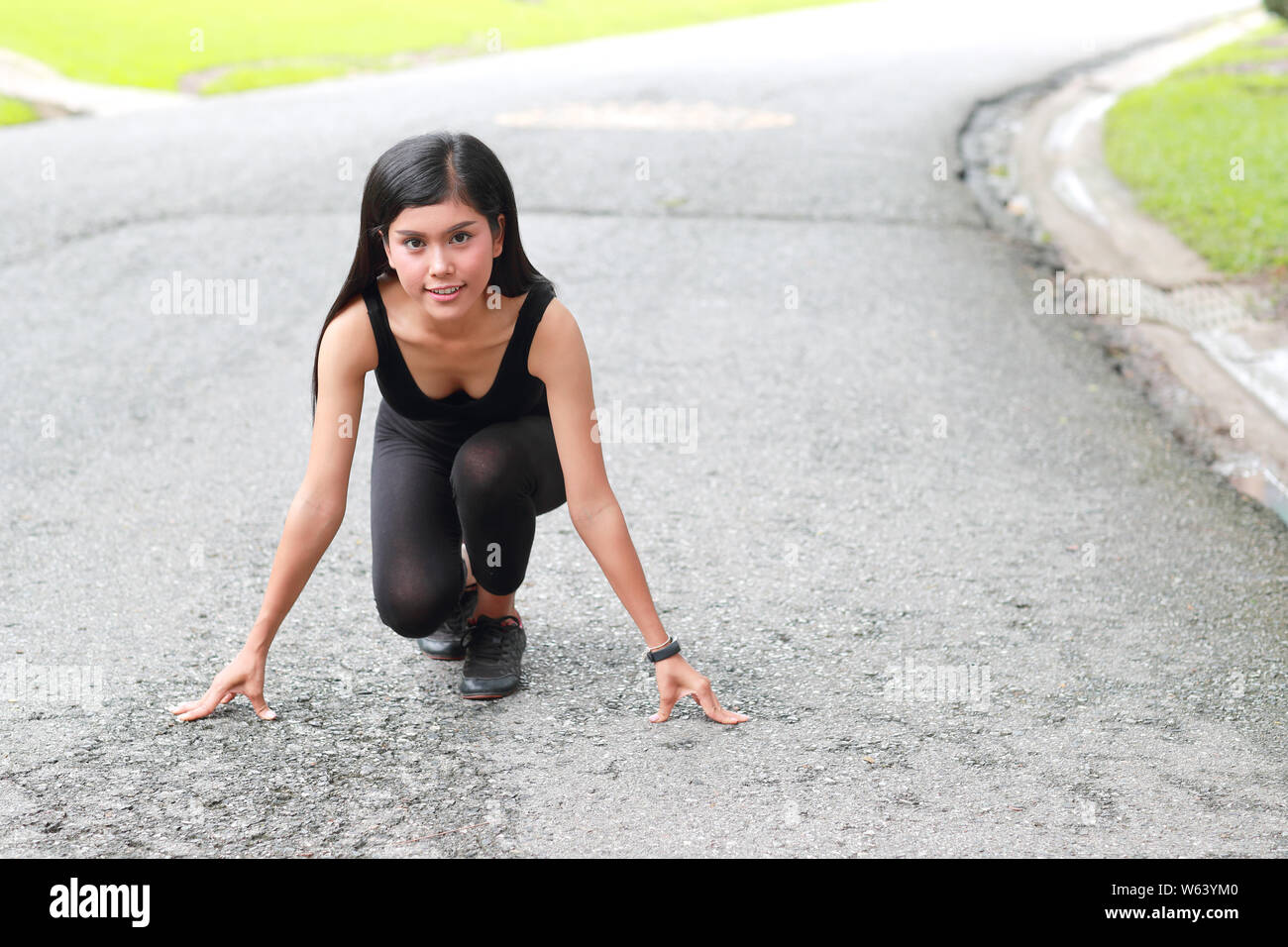 sport runner girl on start Stock Photo - Alamy