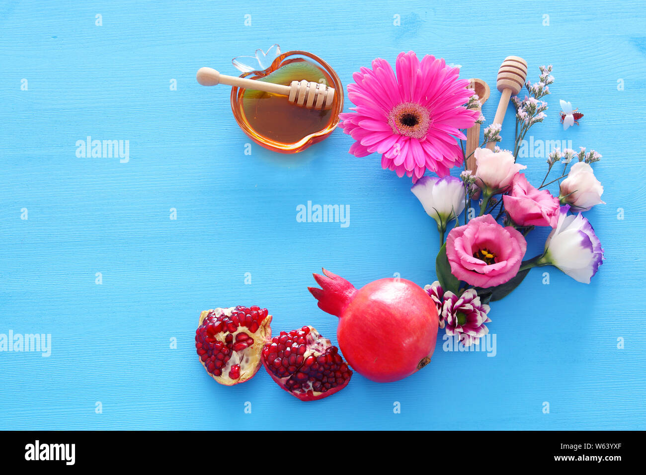 religion image of Rosh hashanah (jewish New Year holiday) concept. Traditional symbols over ...