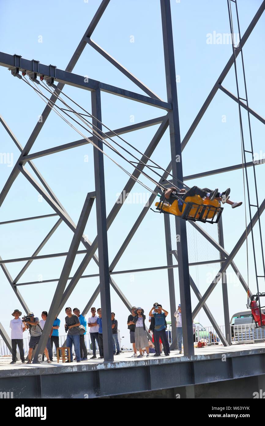 Chinese swings hi-res stock photography and images - Alamy
