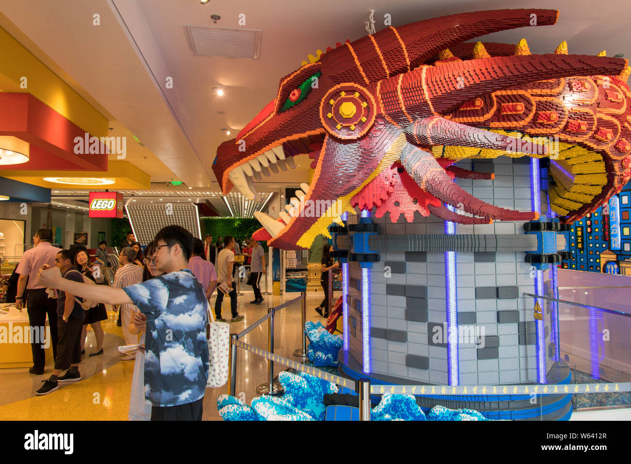Customers visit the second Lego Flagship Store at Shanghai ShiMao ...