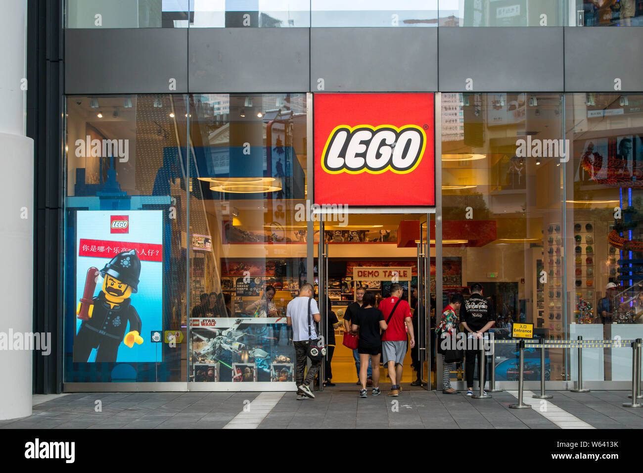 Customers leave the second Lego Flagship Store at Shanghai ShiMao ...