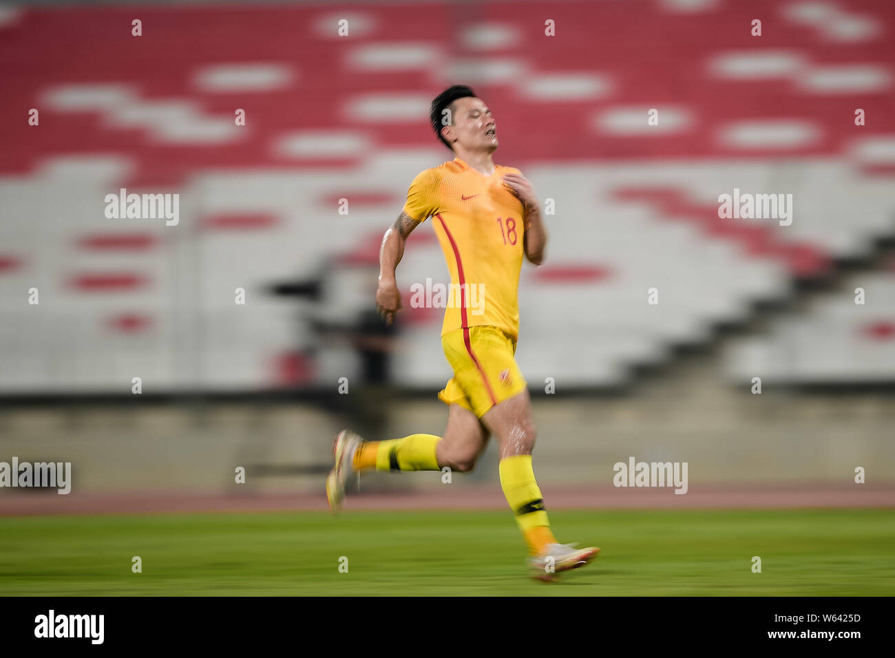 Gao Lin of Chinese national men's football team dribbles against ...