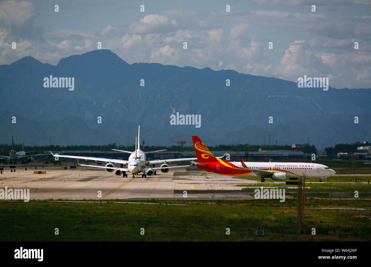 --FILE--A jet plane of Hainan Airlines of HNA Group painted with a ...