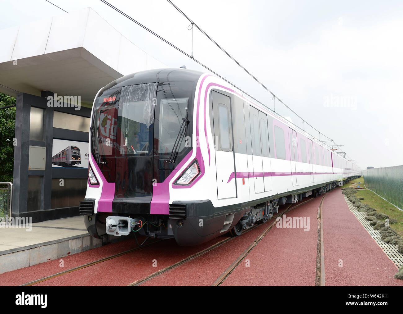 A Chengdu Subway line 5 train using facial makeup in Sichuan opera as ...