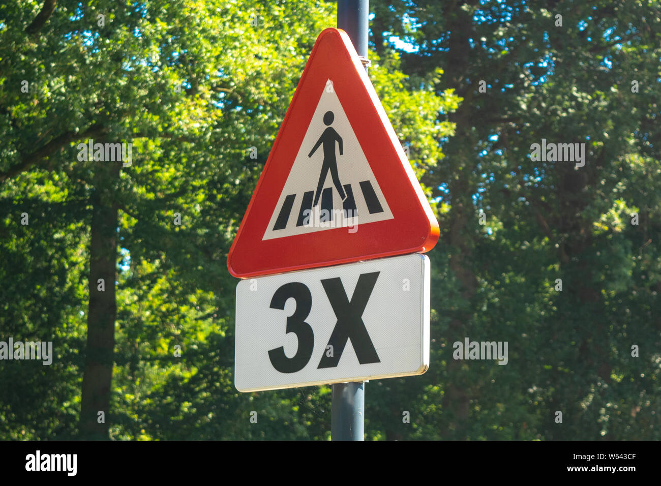 Dutch road sign: Watch out there is a pedestrian crossing Stock Photo ...