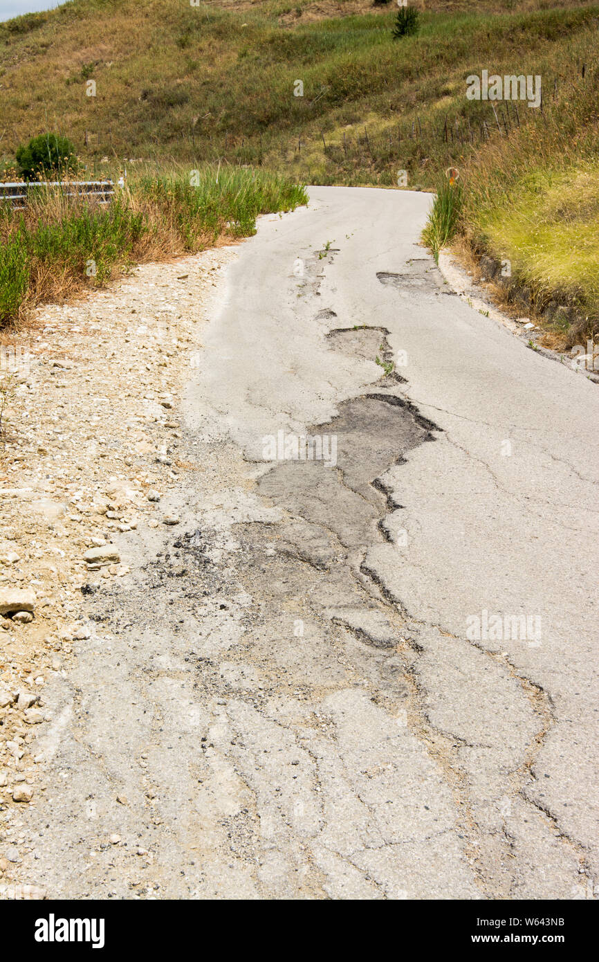 Big pothole on a national road in Sicily caused by landslide ...