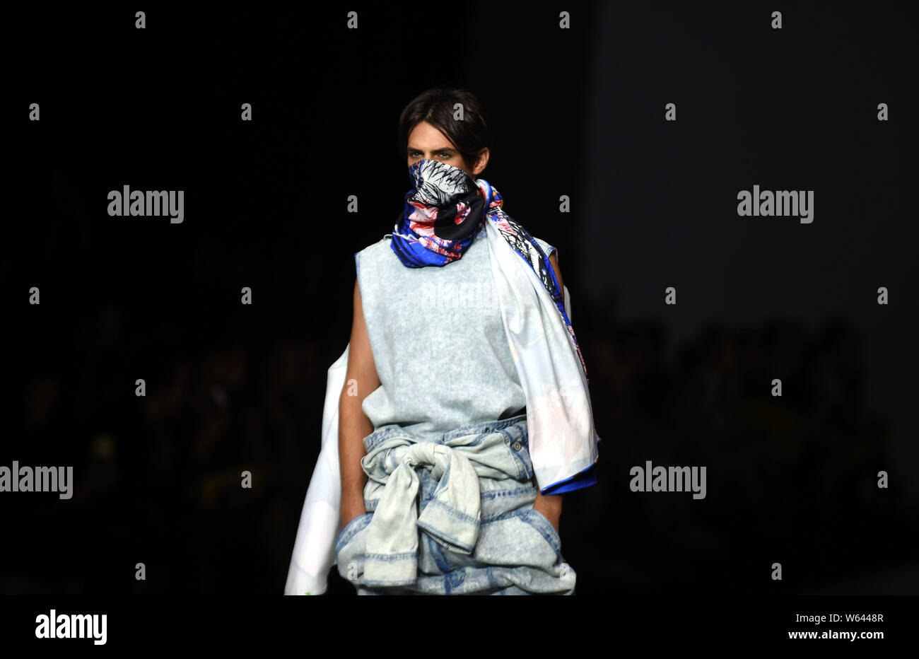 A model displays a new creation in the opening gala show, CENTRESTAGE ...