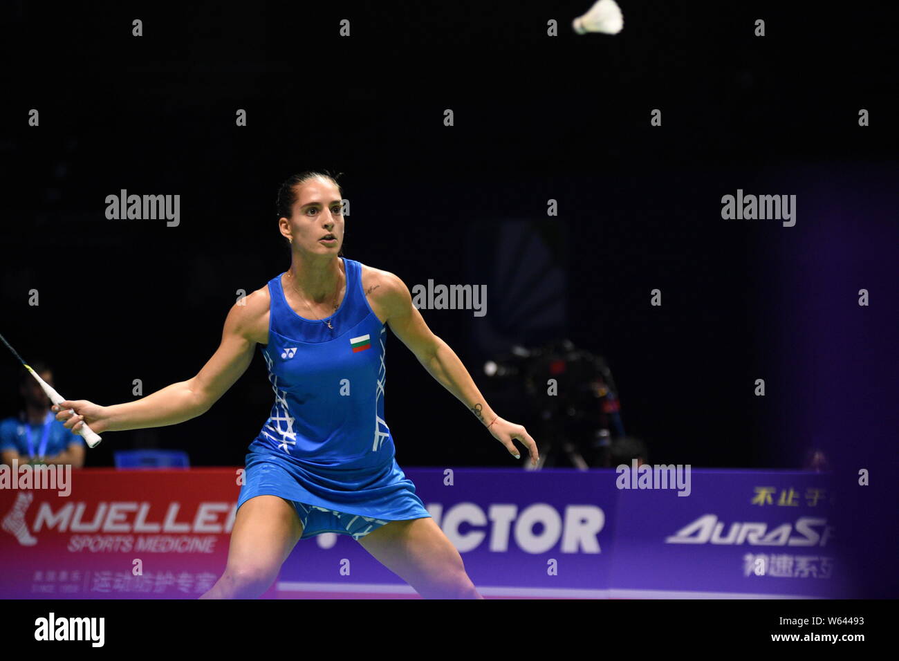 Stefani Stoeva of Bulgaria returns a shot as she and Gabriela Stoeva ...