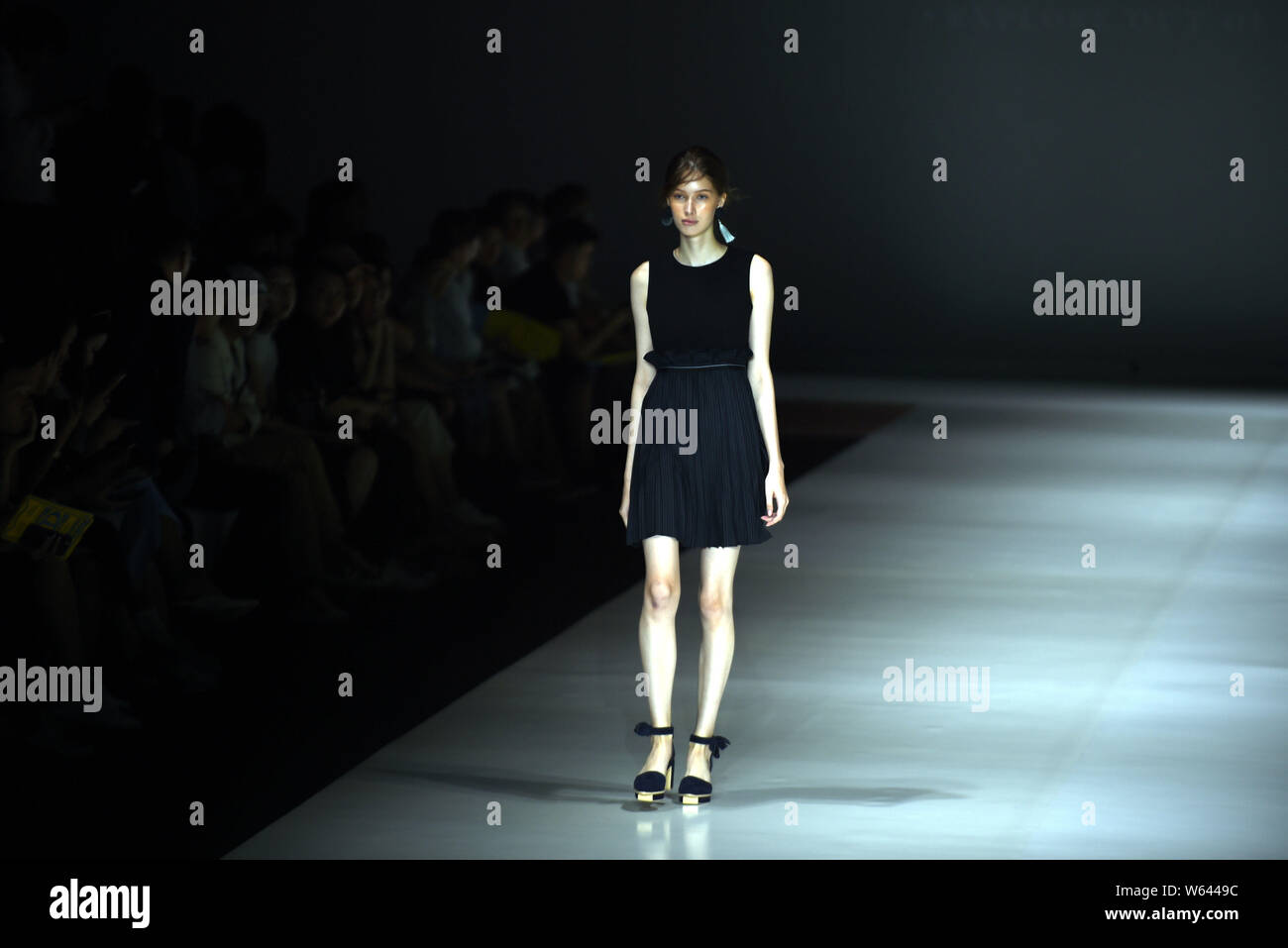 A model displays a new creation in the opening gala show, CENTRESTAGE ...