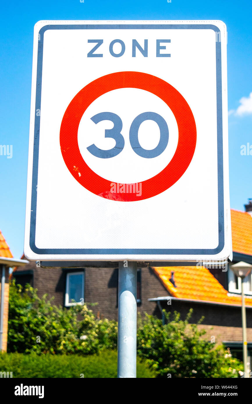 Traffic sign end of zone 30 hi-res stock photography and images - Alamy