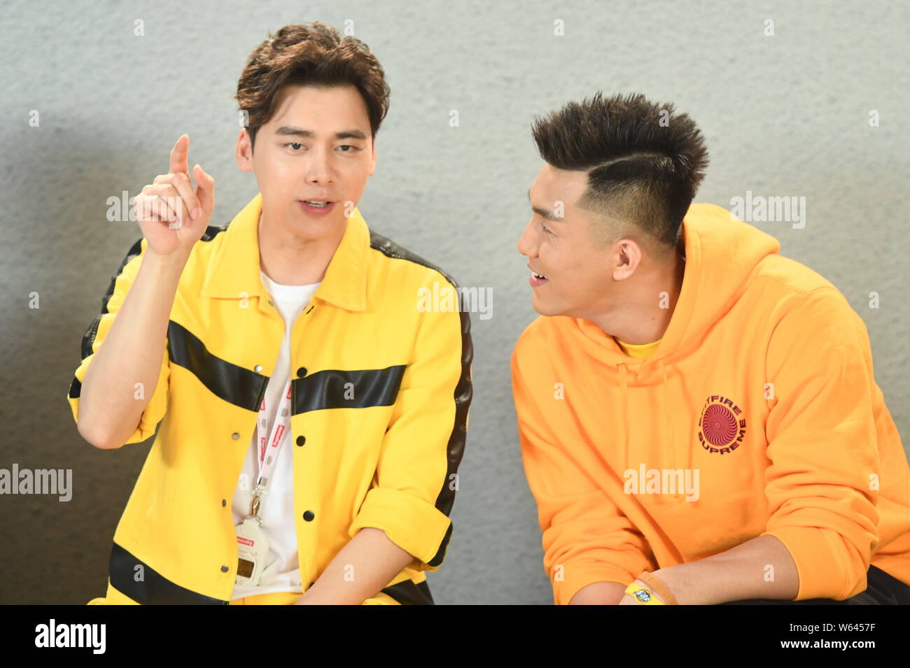 Chinese actor Li Yifeng, left, and Guo Ailun receive an interview for ...