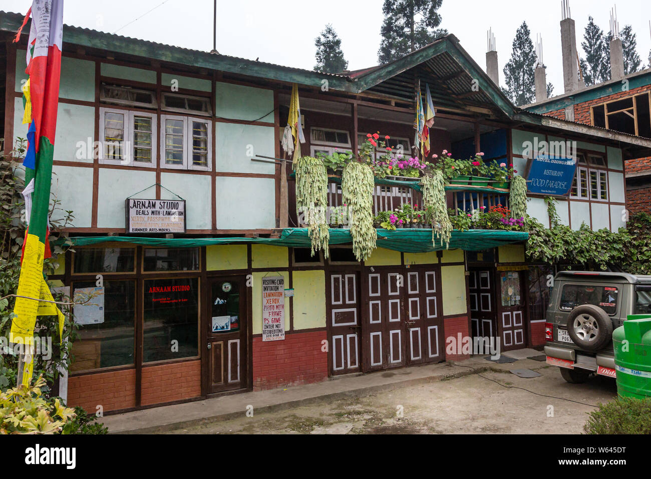 Local houses and shops in the town of Yuskum in the state of Sikkim in ...