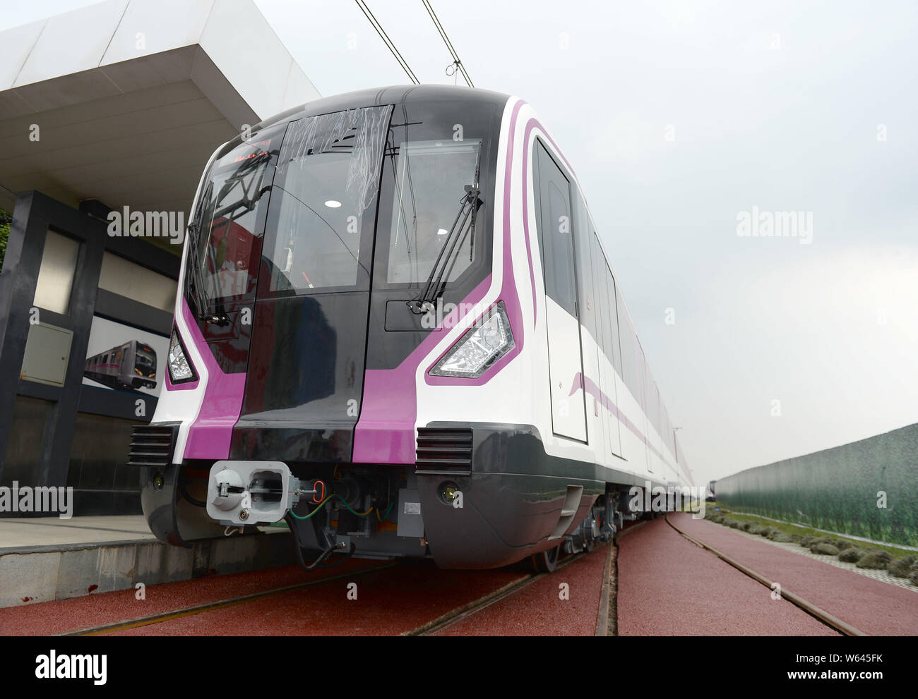 A Chengdu Subway line 5 train using facial makeup in Sichuan opera as ...