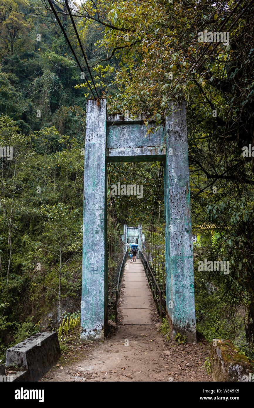 A bridge on the Gochela trekking trail to the Kanchenjunga mountain in ...