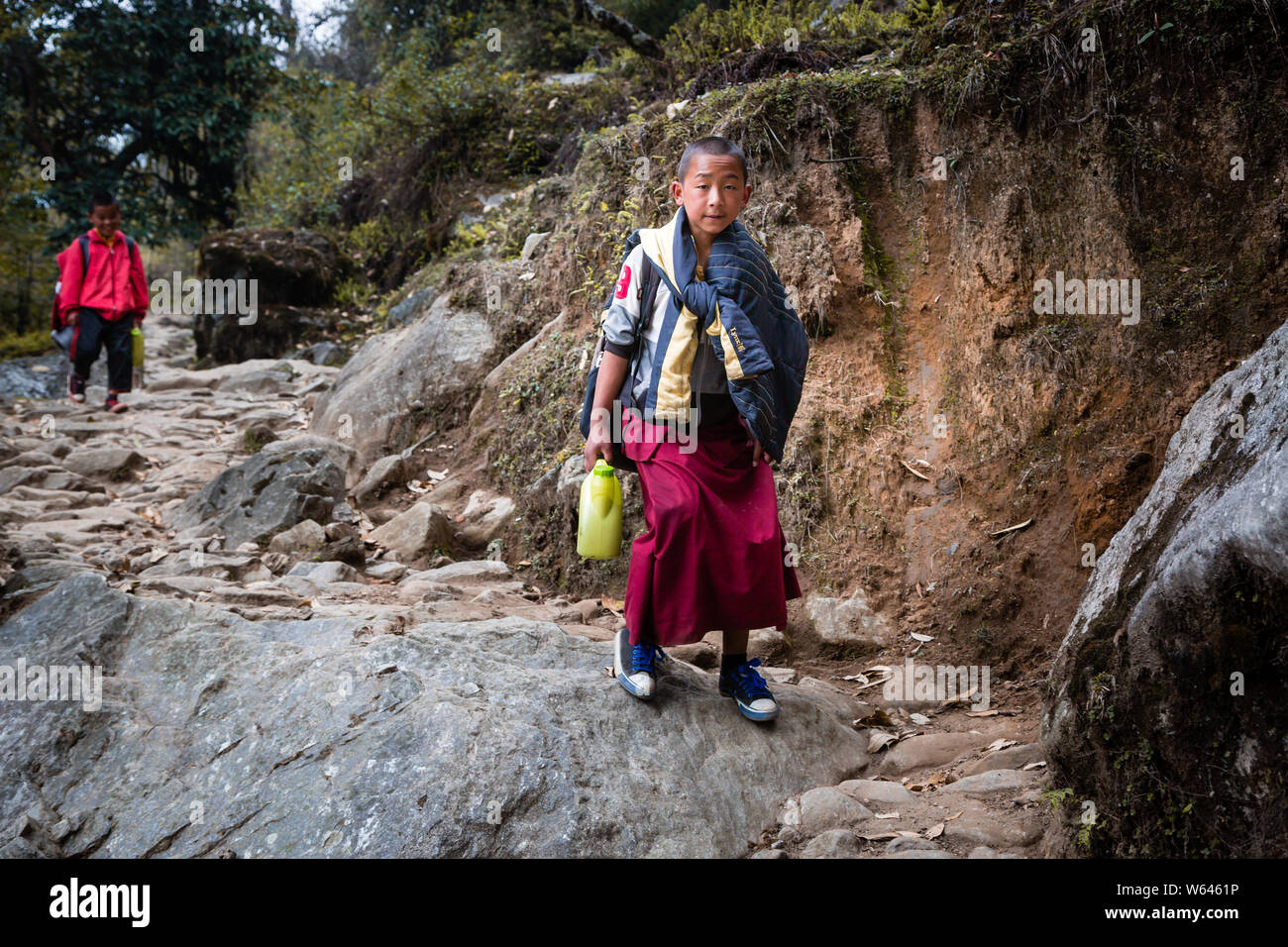 A young Buddhist monk on the Gochela trekking trail to the Kanchenjunga ...