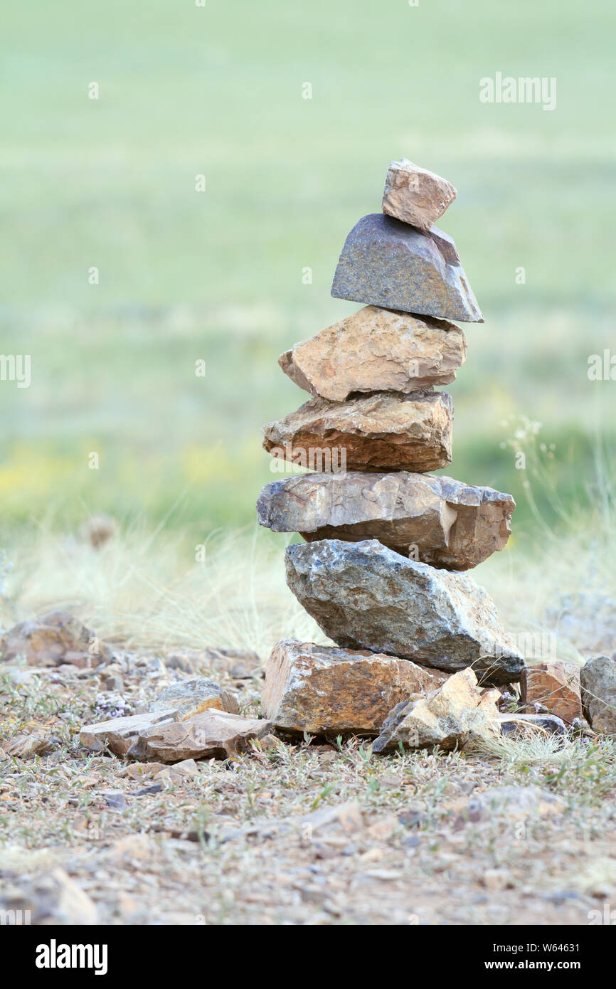 The small stones drawn each other like a pyramid Stock Photo - Alamy
