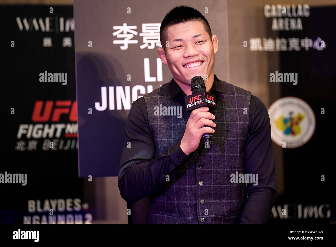 Chinese mixed martial artist Li Jingliang attends a press conference ...