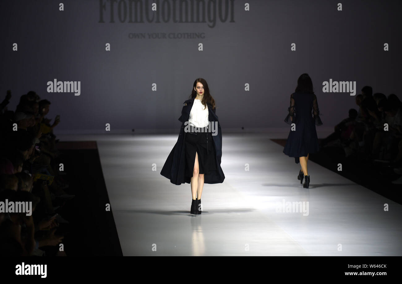 A model displays a new creation in the opening gala show, CENTRESTAGE ...