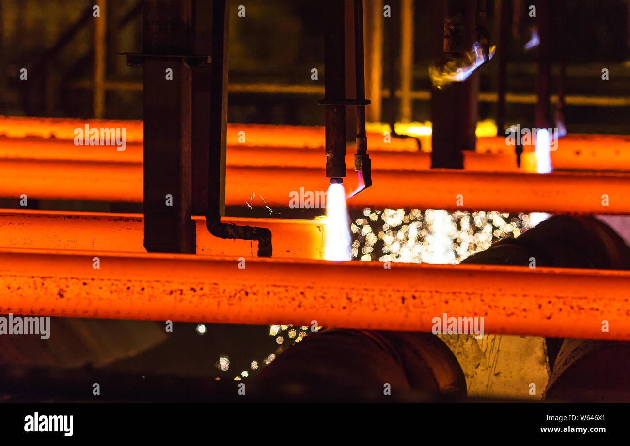 Steel Billets at Torch Cutting. Metallurgical plant Stock Photo - Alamy