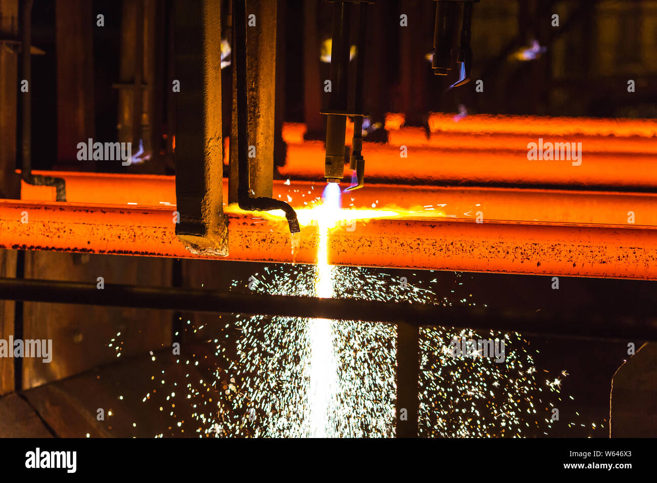 Steel Billets at Torch Cutting. Metallurgical plant Stock Photo - Alamy