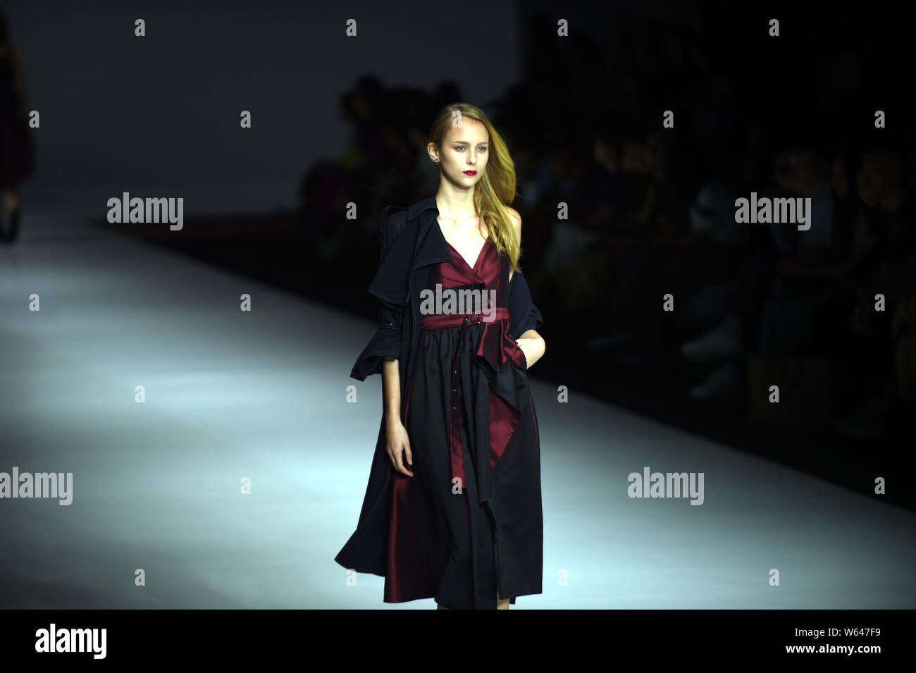 A model displays a new creation in the opening gala show, CENTRESTAGE ...