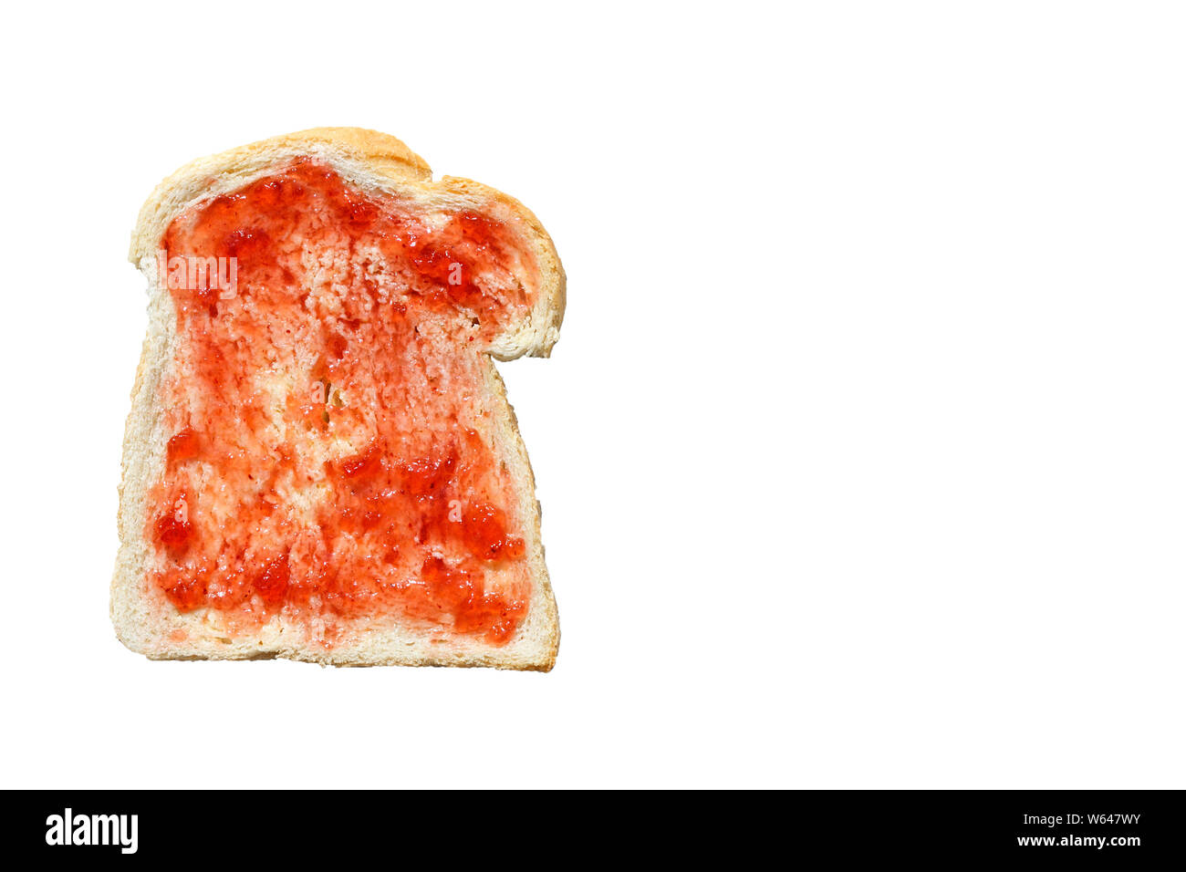 One slice of white bread spread with strawberry jam - directly above ...