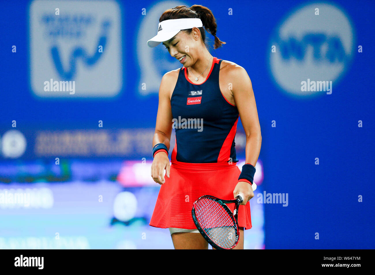 Wang Qiang of China reacts as she competes against Daria Gavrilova of ...