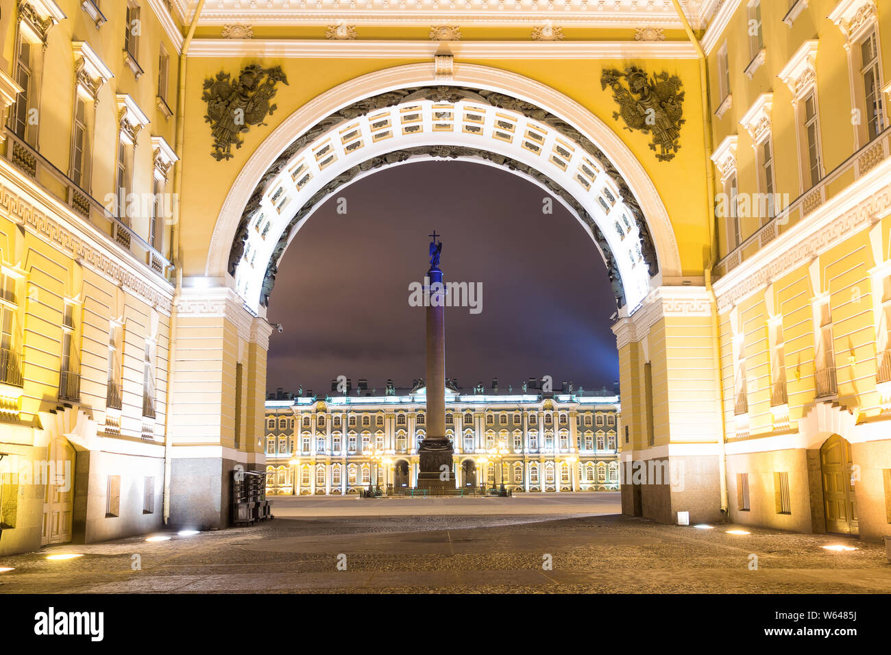 View of the Palace Square through the arch at night Stock Photo - Alamy