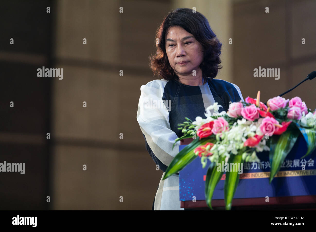 Dong Mingzhu, Chairwoman and President of Gree Electric Appliances Inc., delivers a speech ...