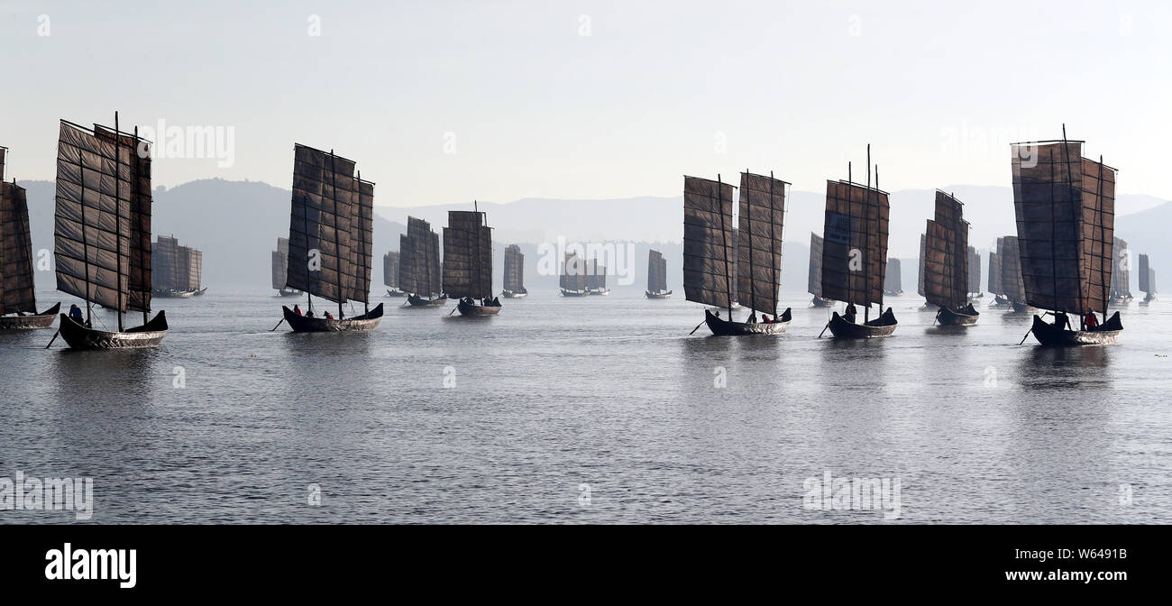 Fishing boats leave a port to resume fishing as Dianchi Lake enters the ...