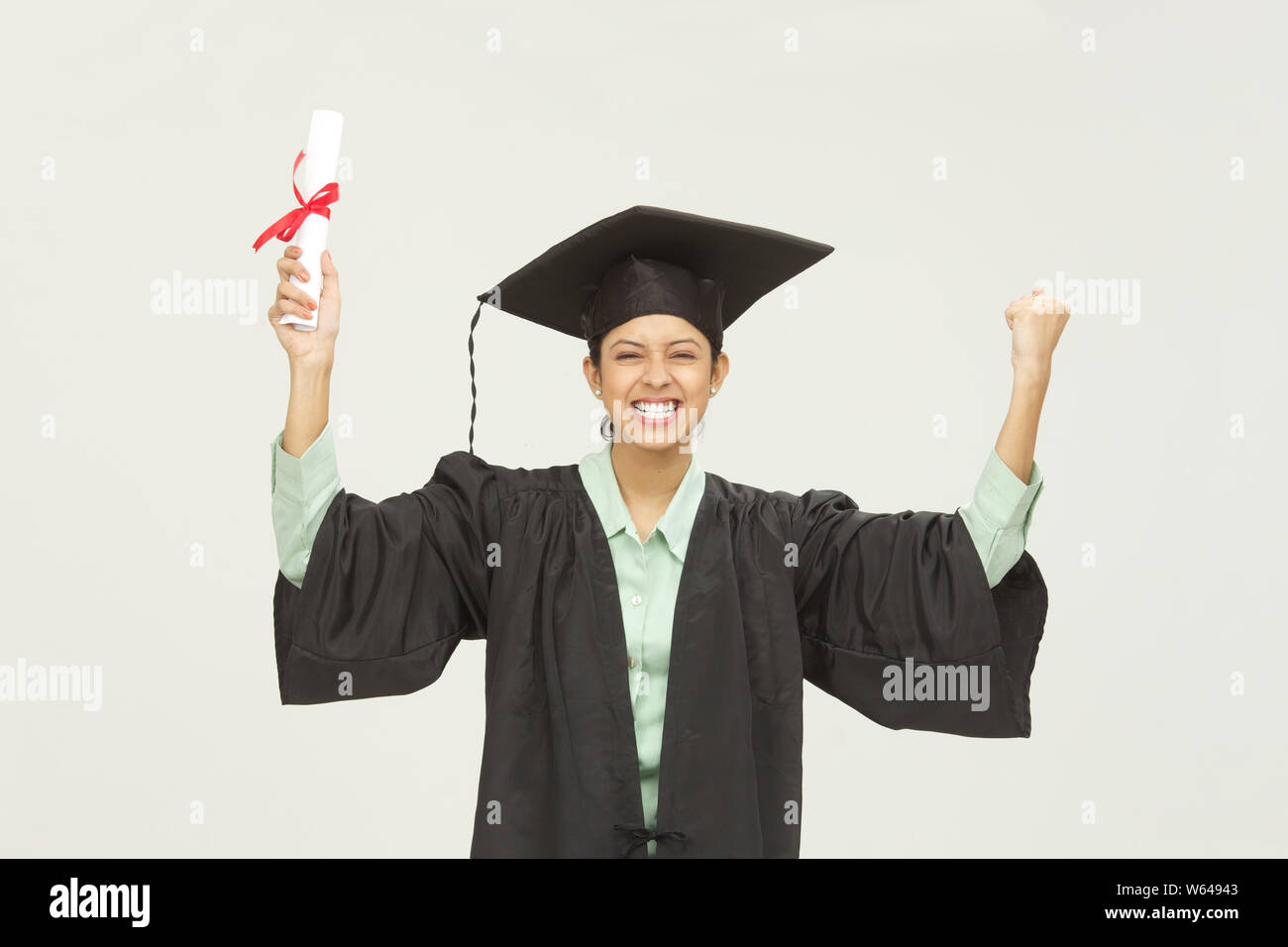 University student celebrating graduation Stock Photo - Alamy